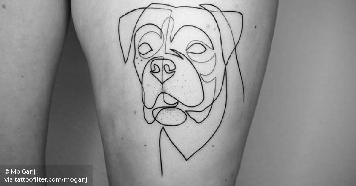 Single line boxer tattoo on the left thigh.
