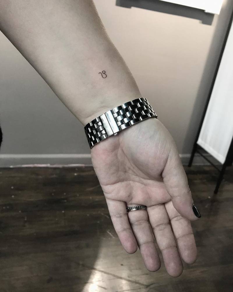 Leo Zodiac Symbol Tattoo On The Left Inner Wrist Leo Zodiac Symbol Tattoo On The Left Inner Wrist