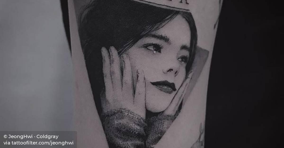 Björk portrait tattoo on the right upper arm.