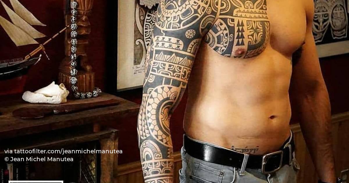 Polynesian style full sleeve and chest tattoo.
