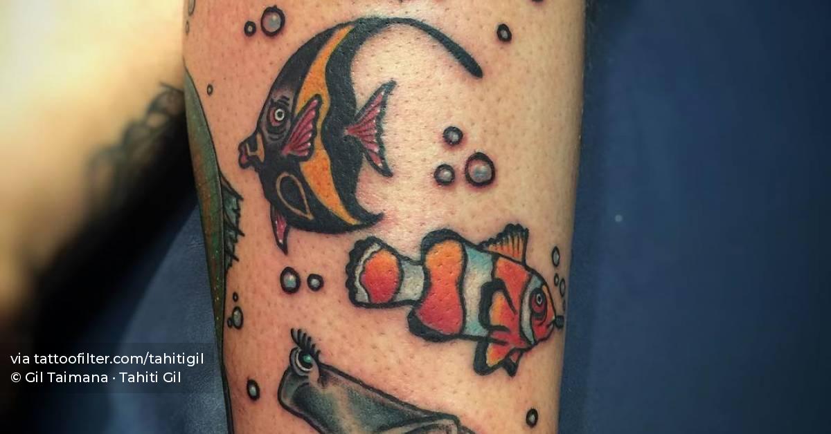 Traditional style fish tattoo on the shin.