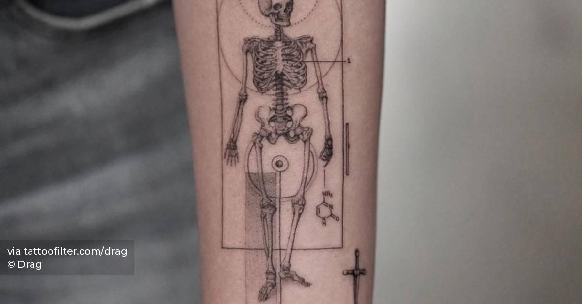 Micro-realistic skeleton tattoo on the inner forearm.