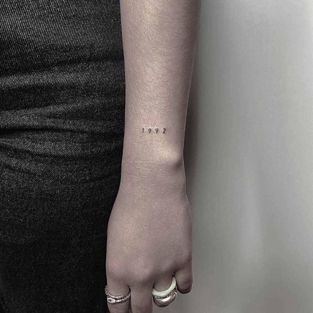 1992 Lettering Tattoo On The Wrist 1992 Lettering Tattoo On The Wrist