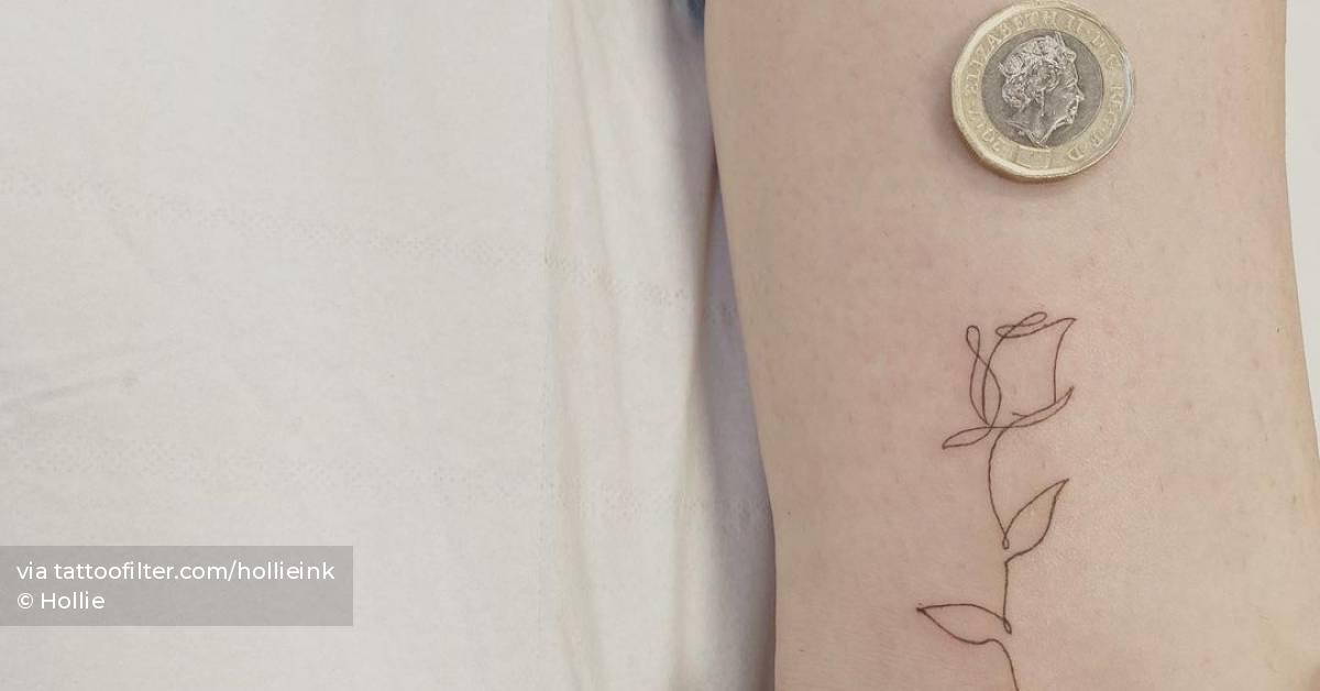 One line rose tattoo on the ankle.