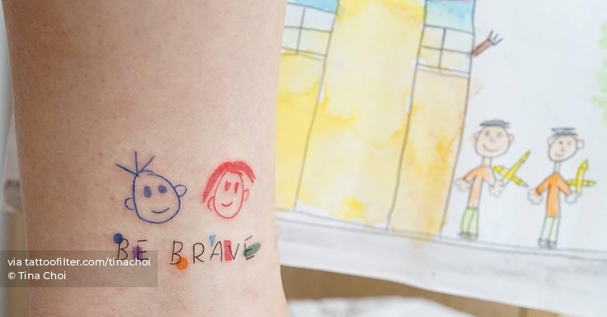 Child's drawing tattoo on the ankle.