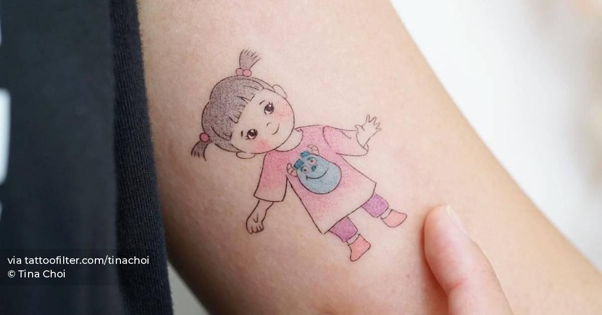 Watercolor Boo tattoo on the bicep.