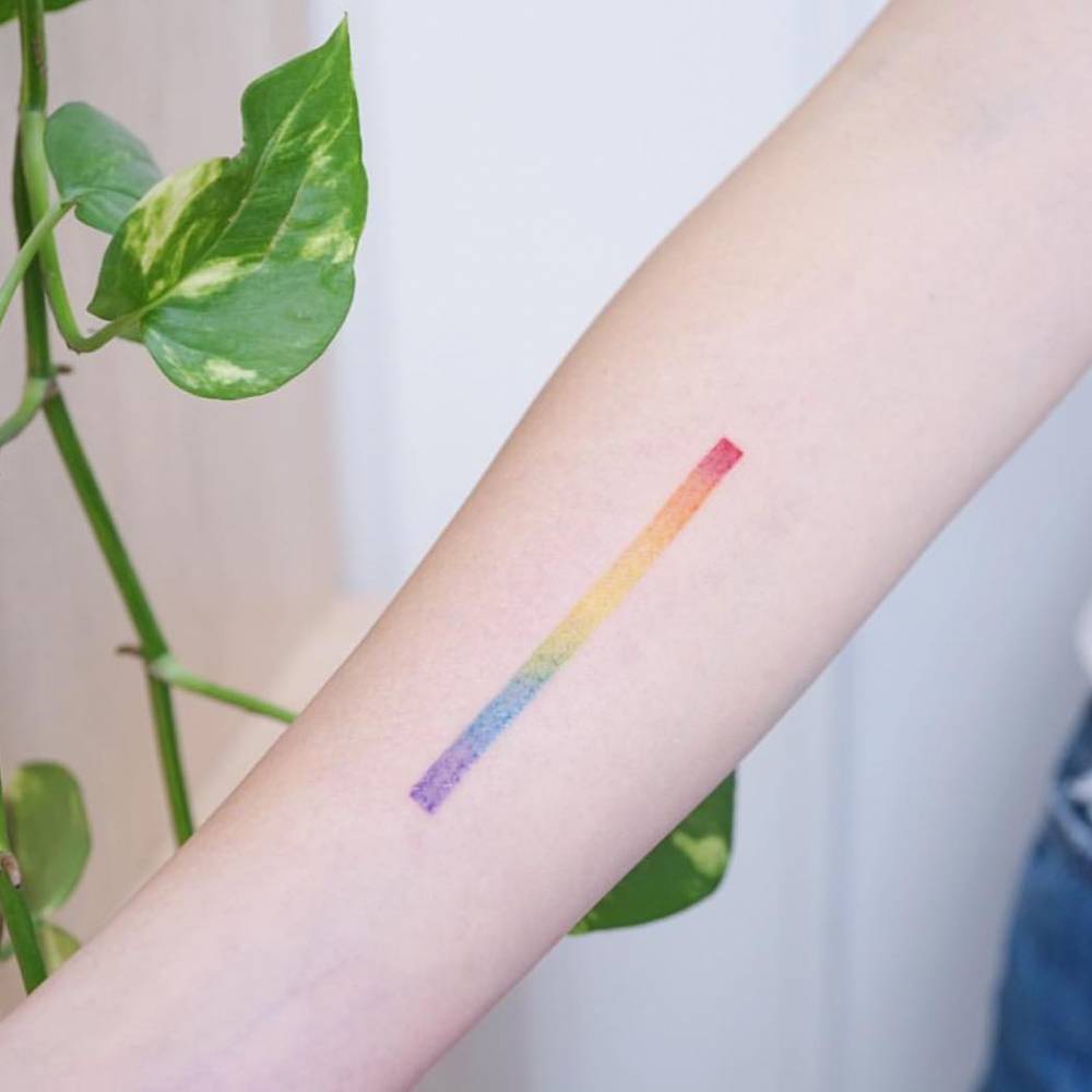 Minimalist Rainbow Line Tattoo On The Inner Forearm Minimalist Rainbow Line Tattoo On The Inner Forearm