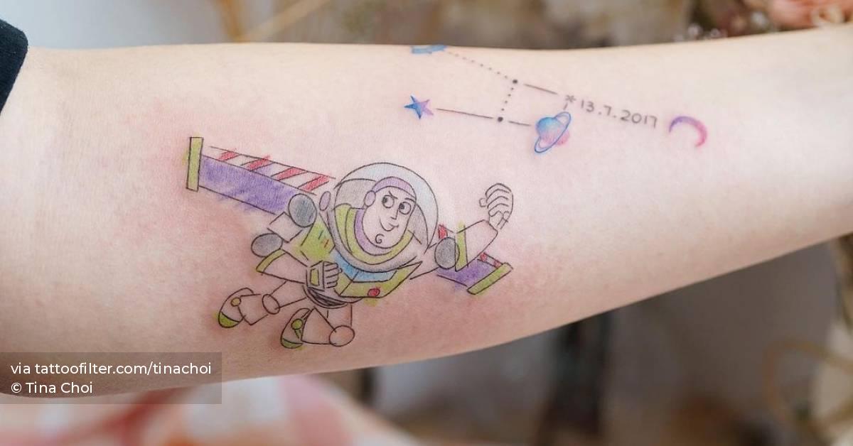 Buzz Lightyear tattoo on the inner forearm.