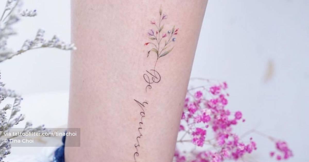 "Be yourself" and baby's breath tattoo on the ankle.