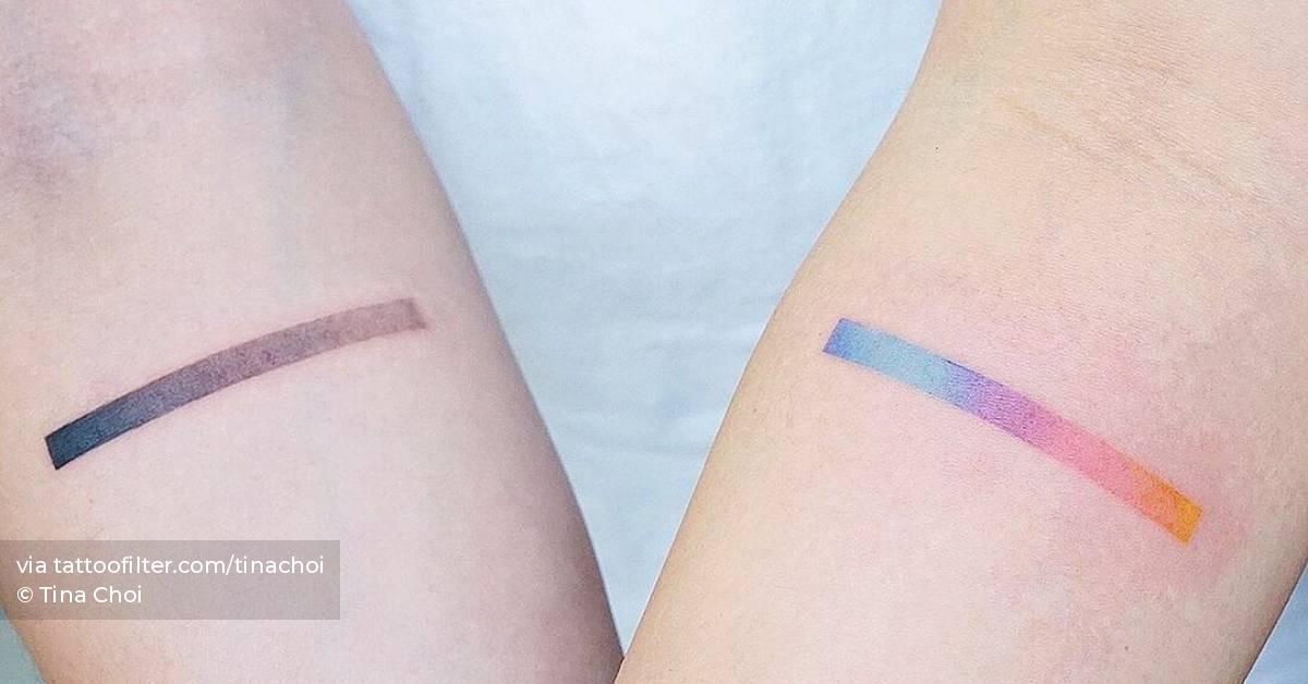 Minimalist matching line tattoo for couple.