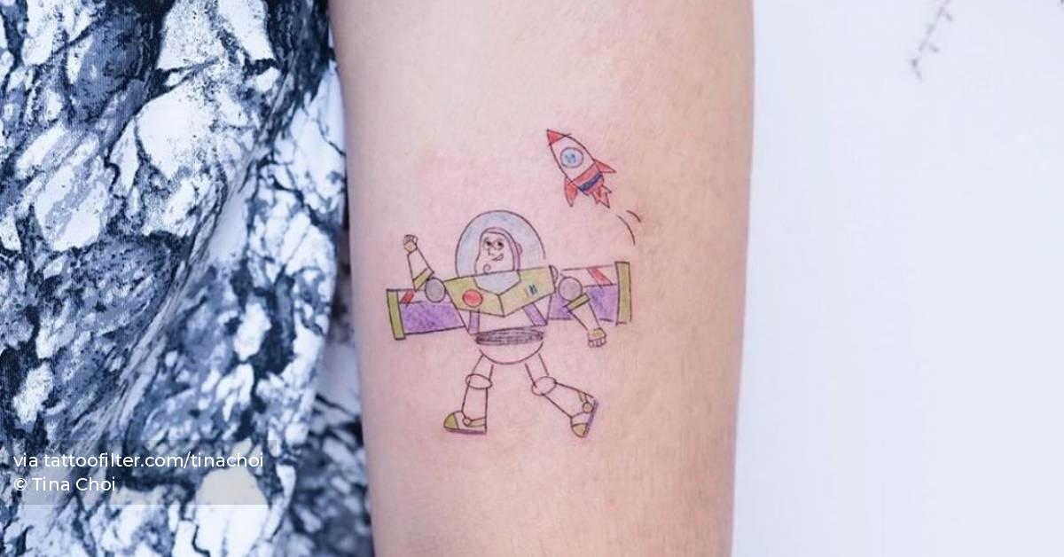 Buzz Lightyear tattoo on the upper arm.