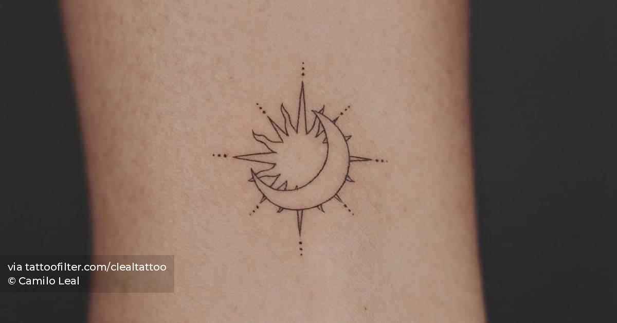 Fine line sun and moon tattoo on the ankle.
