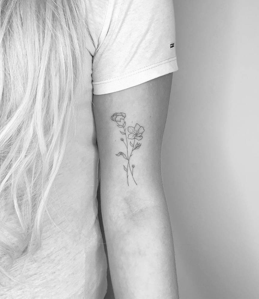 FIne Line Flower Tattoo On The Bicep FIne Line Flower Tattoo On The Bicep