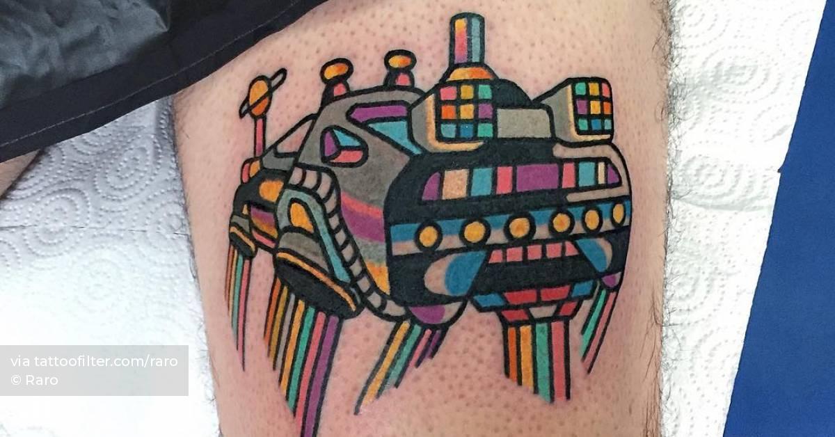 Pop art DeLorean tattoo on the thigh.