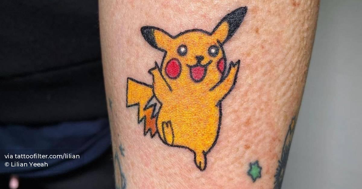 Hand poked Pikachu tattoo on the inner forearm.
