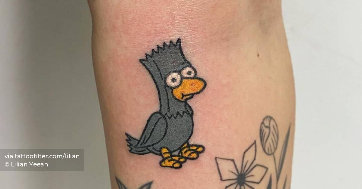Hand poked crow Bart Simpson tattoo on the inner