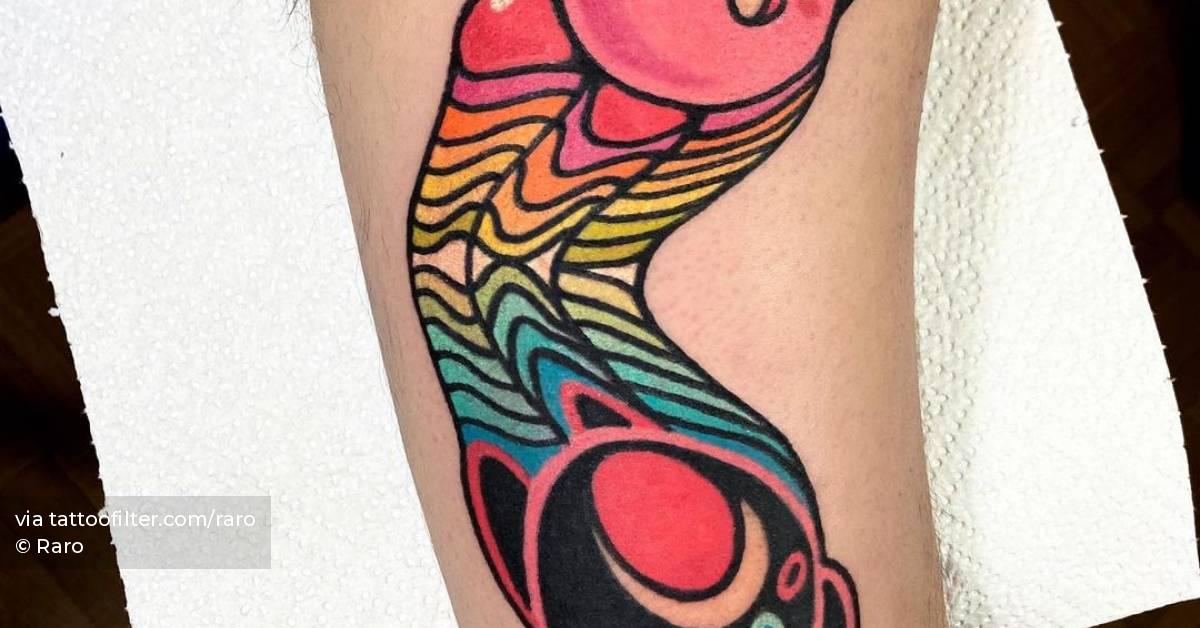 Pop art Kirby tattoo on the tricep.