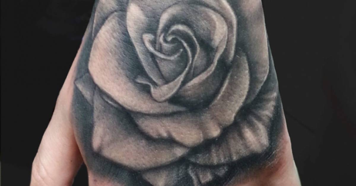 Rose Hand Tattoo by Jesse Vardaro