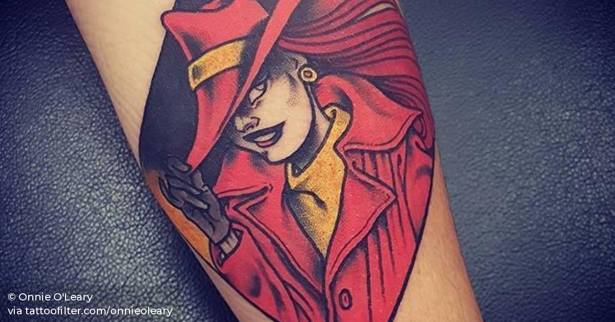 Carmen Sandiego tattoo on the inner forearm.