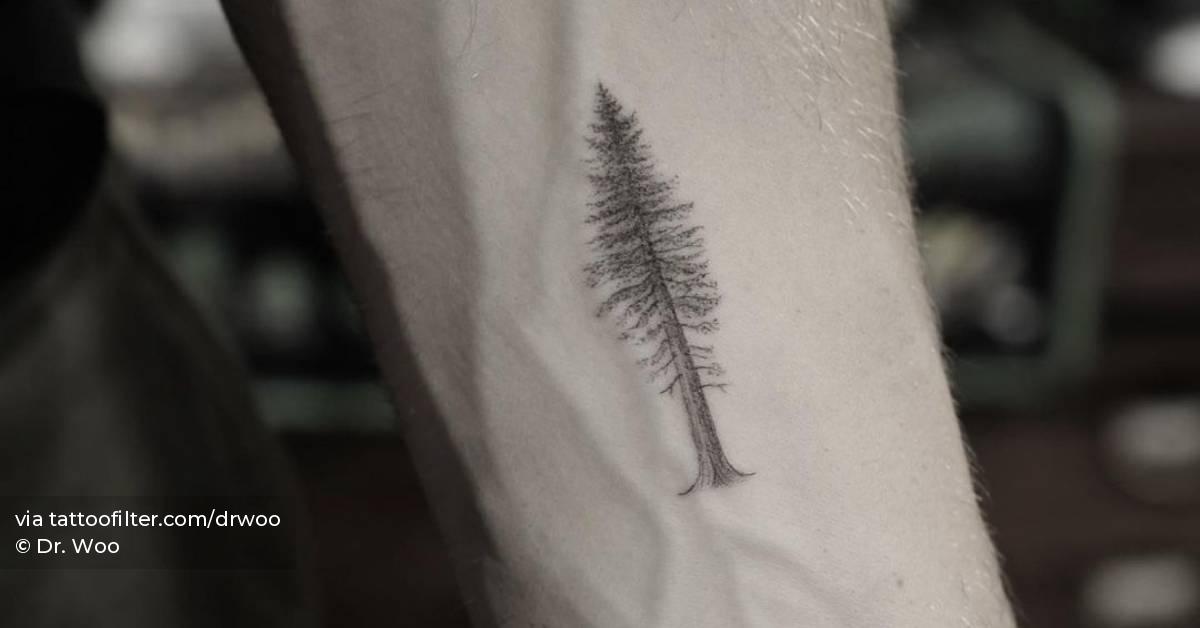 Micro-realistic pine tree tattoo on Keegan Allen's