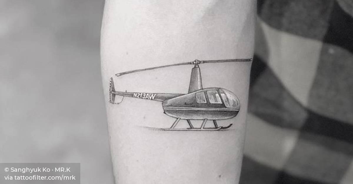 Robinson R44 helicopter tattoo on the right inner