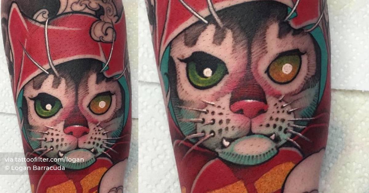 New School cat portrait tattoo on the forearm.