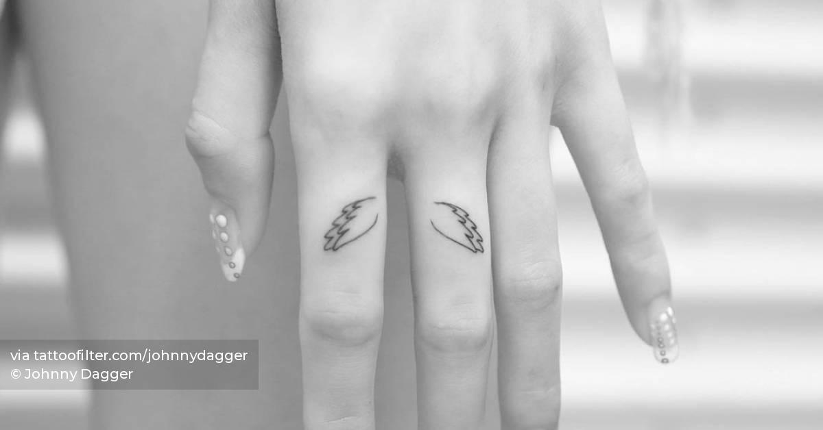 Fine line individual matching wings tattoo on the