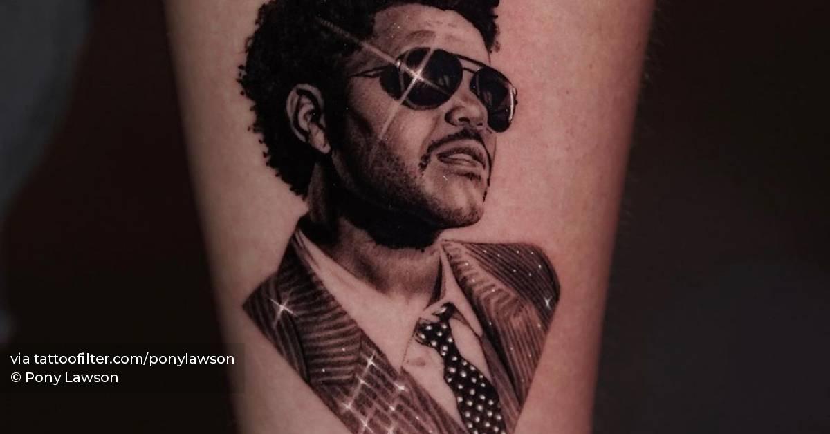 Micro-realistic The Weeknd portrait tattoo on the inner