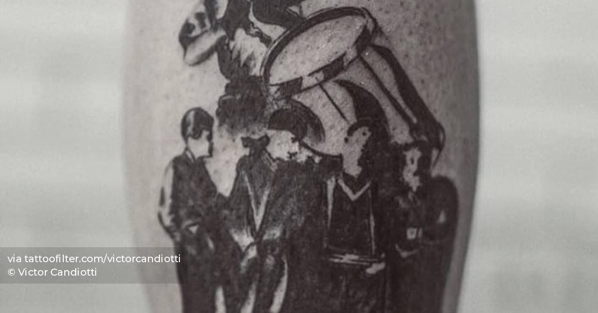 Blackwork Joy Division tattoo on the calf.