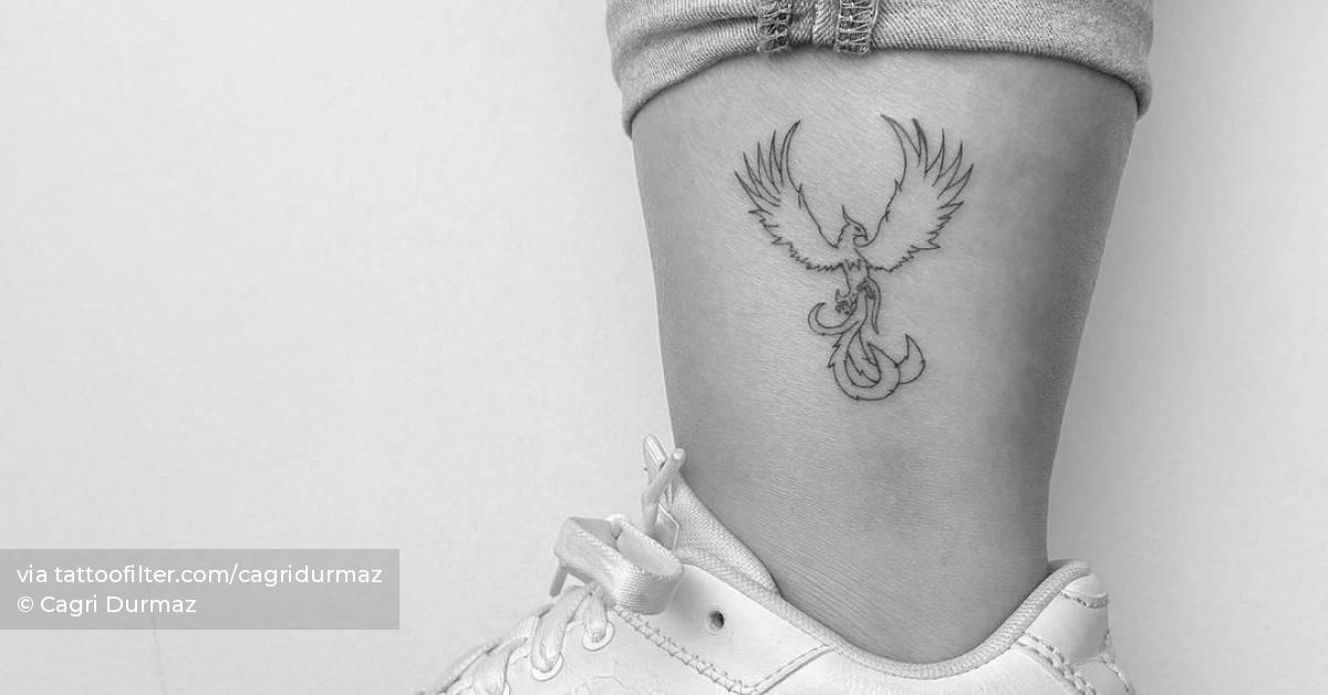 Fine line Phoenix tattoo on the ankle.
