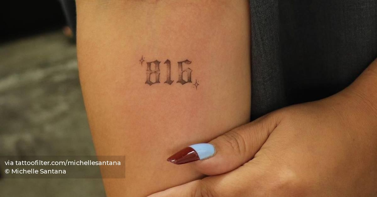 "816" lettering tattoo on the inner forearm.