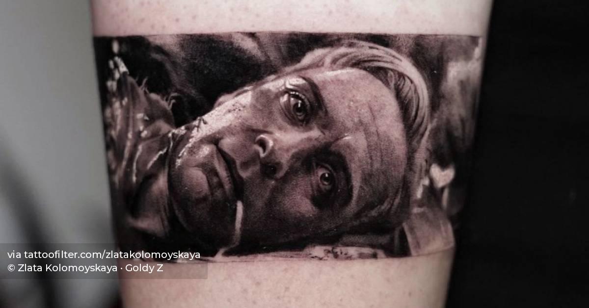 Micro-realistic Prometheus (2012) tattoo on the upper