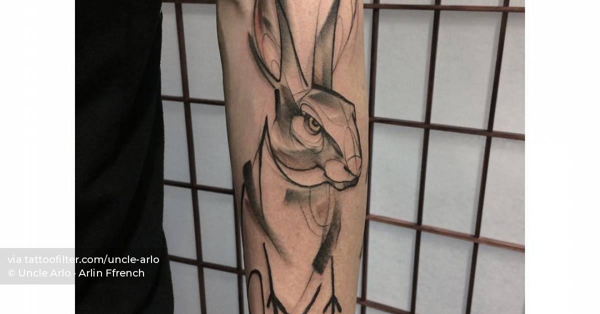 Sketch work rabbit tattoo on the forearm.