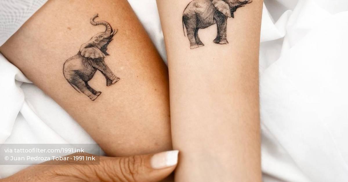 Micro-realistic matching elephant tattoos for mother