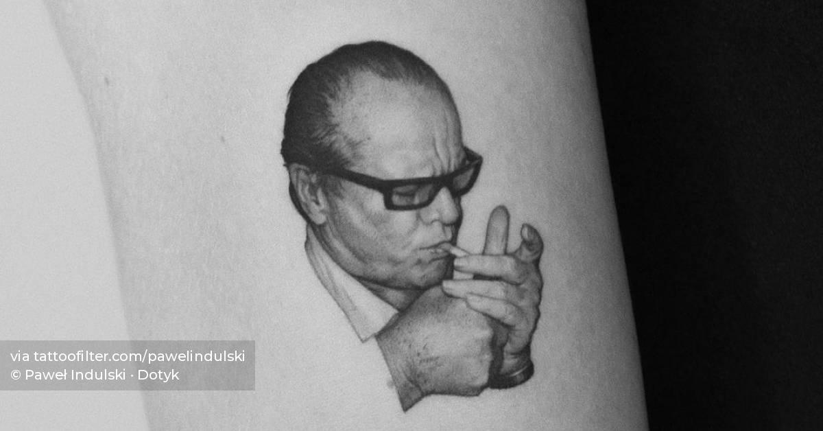 Micro-realistic Jack Nicholson portrait tattoo on the