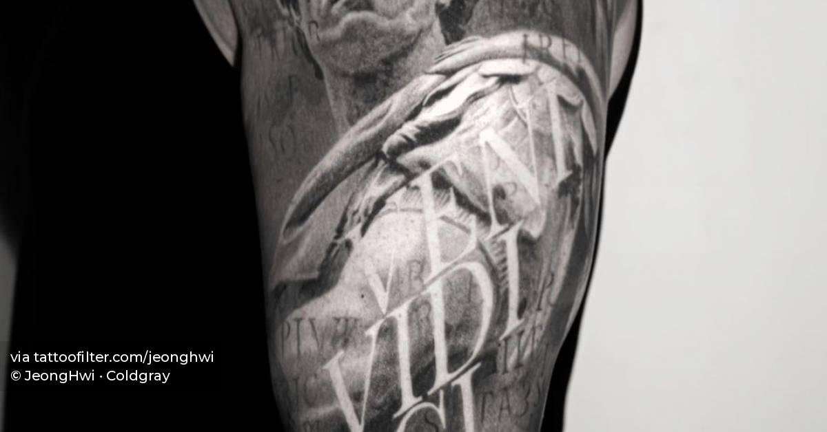 Black and grey Julius Caesar portrait tattoo on the