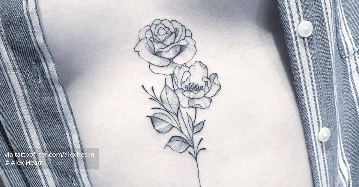 Fine line rose and peony tattoo on the sternum.