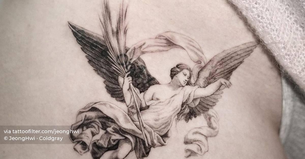 Micro-realistic angel tattoo on the pelvis.