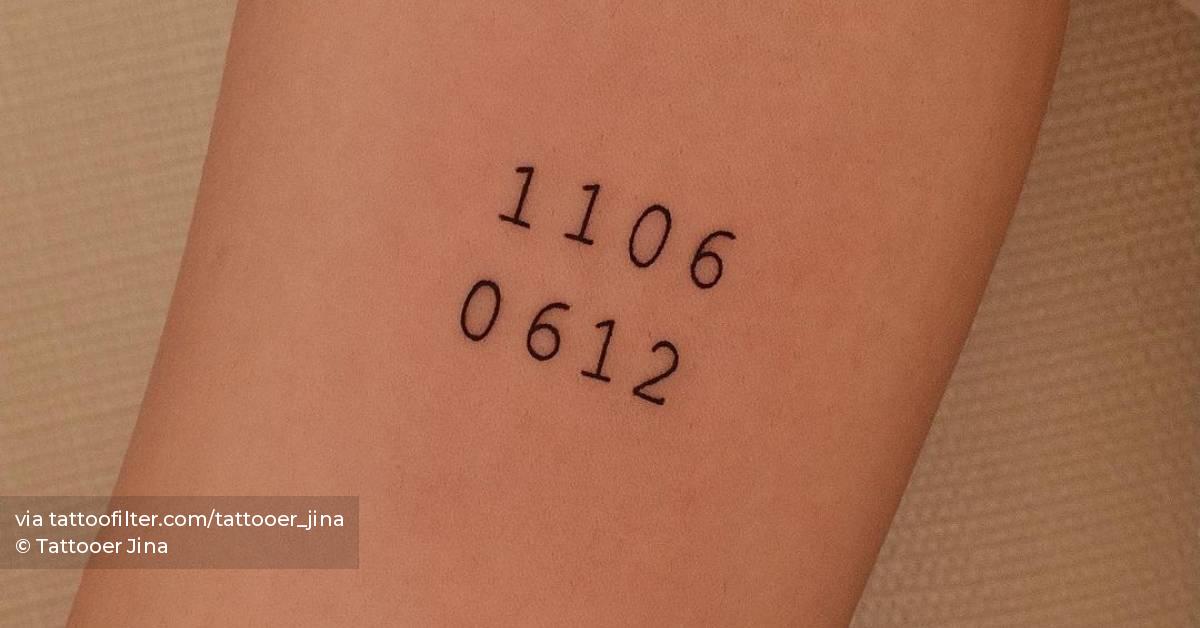 Numbers tattoo on the inner arm.