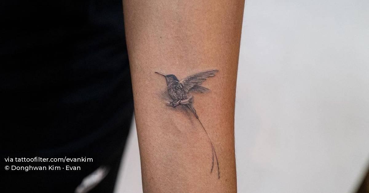 Micro-realistic hummingbird tattoo on the inner