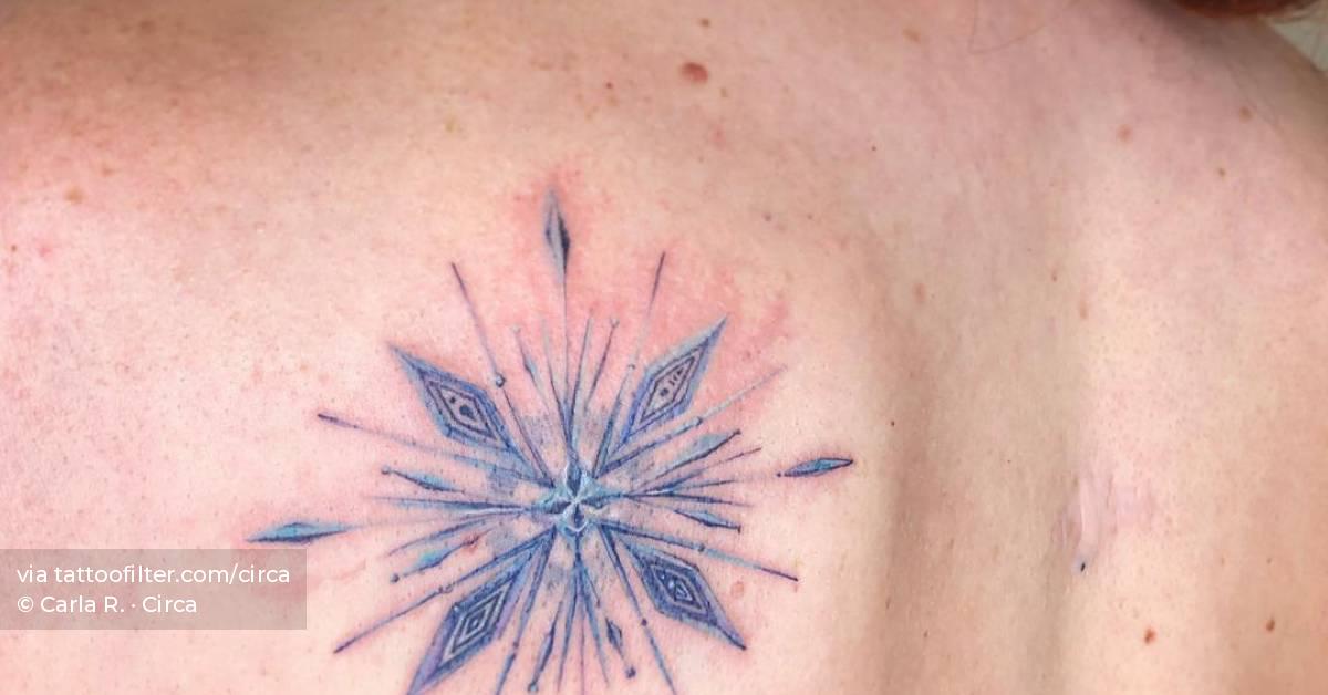 Snowflake from Frozen tattooed on the shoulder blade.
