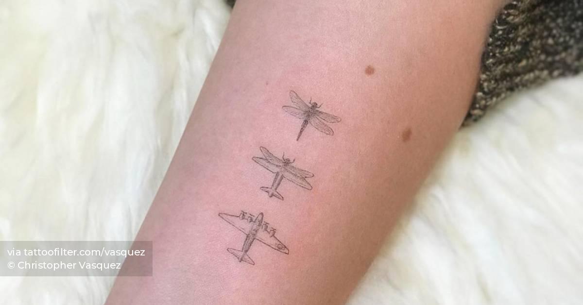 Fine line airplane to dragonfly tattoo on the inner