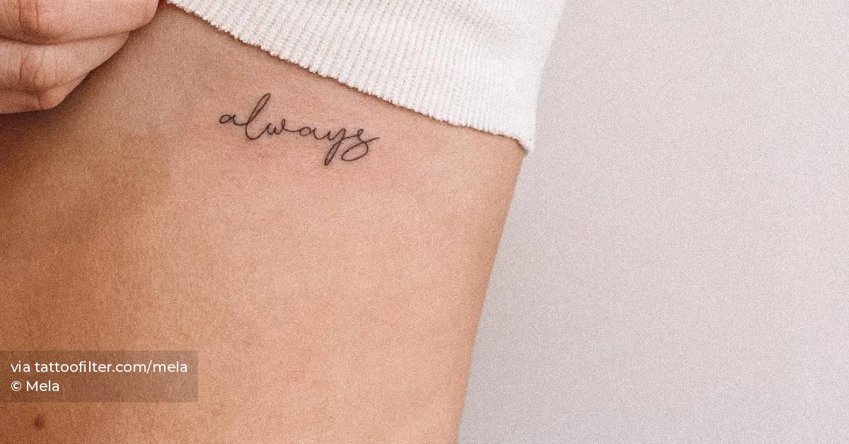 "Always" lettering tattoo on the rib.