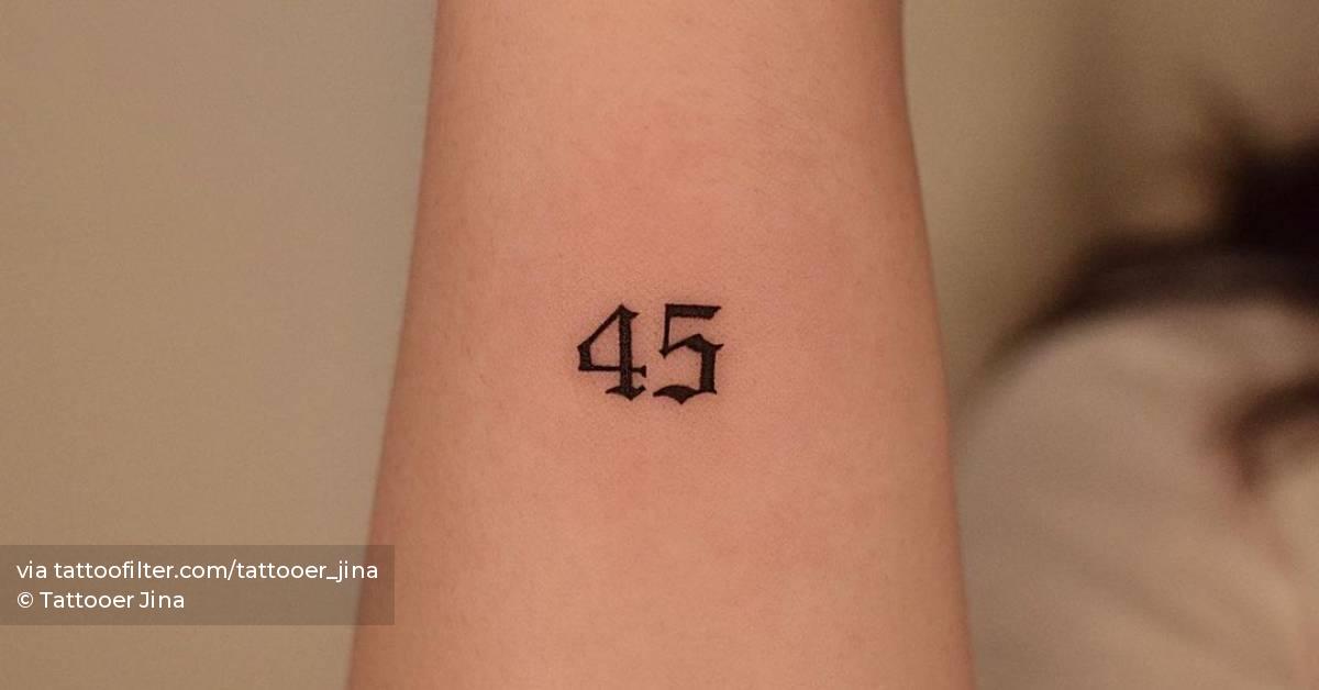Number "45" tattooed on the forearm