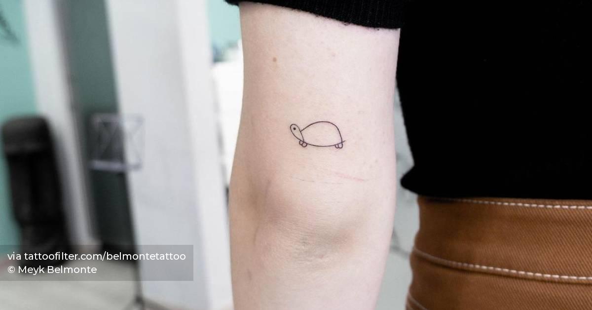 Minimalist turtle tattoo in fine line