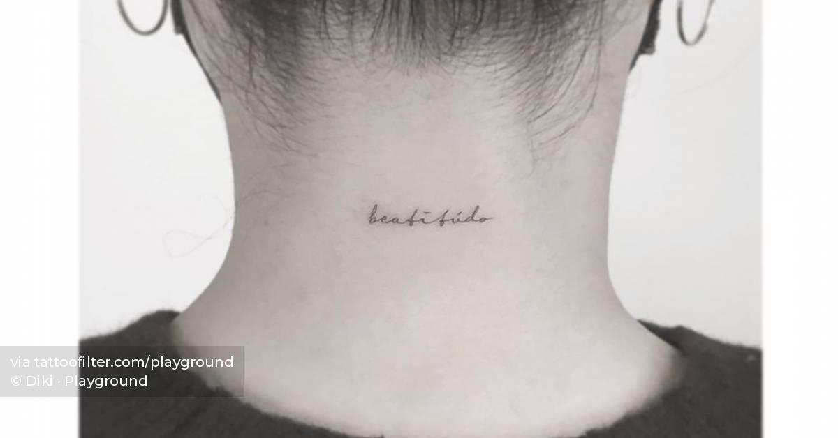 "Beatitudo" lettering tattoo on the back of the neck.