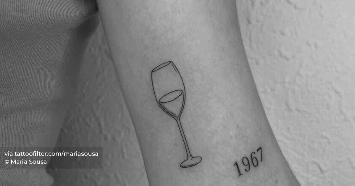 Fine line wine glass and "1967" tattoos.