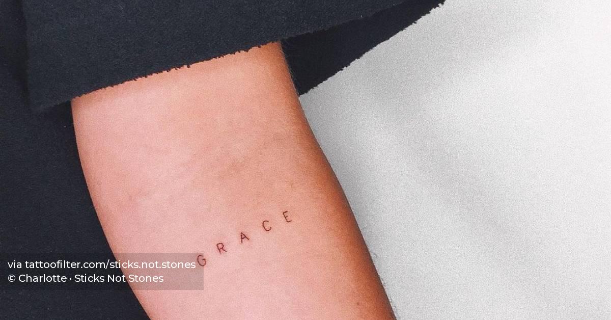Hand poked "grace" tattoo done on the inner forearm.