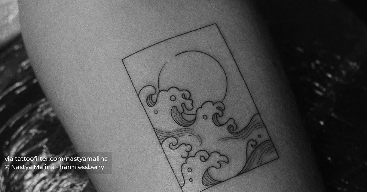 Artsy wave and sun tattoo located on the inner forearm.