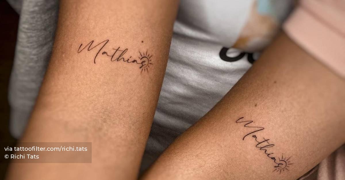 Matching "Mathias" lettering tattoo for sisters.